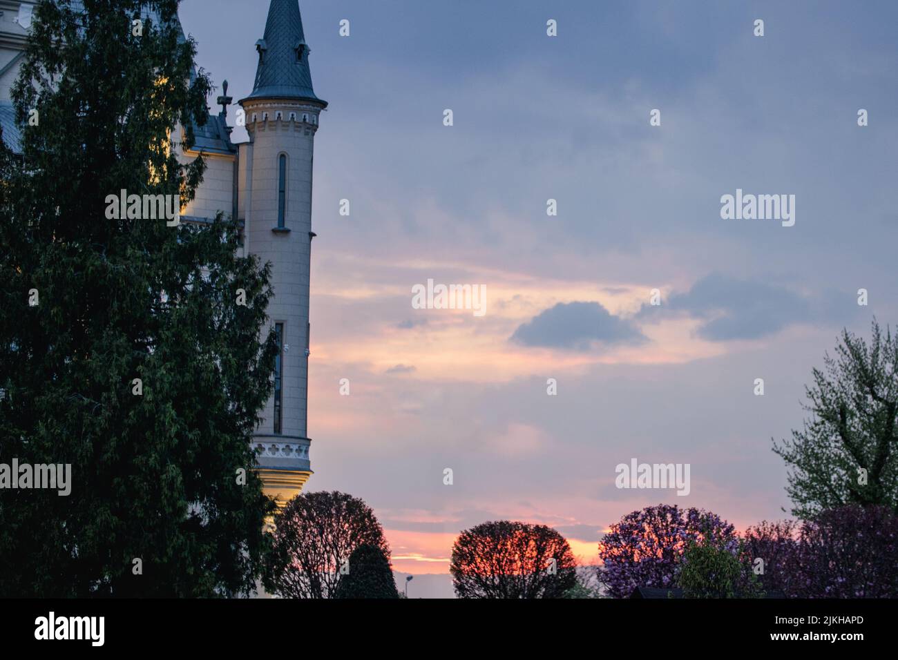 The tower of a cathedral under a sunset sky in Iasi, Romania Stock ...