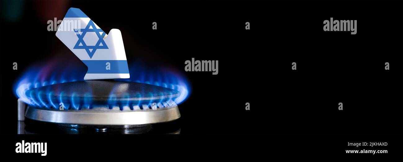 Decreased gas supplies in Israel. A gas stove with a burning flame and ...