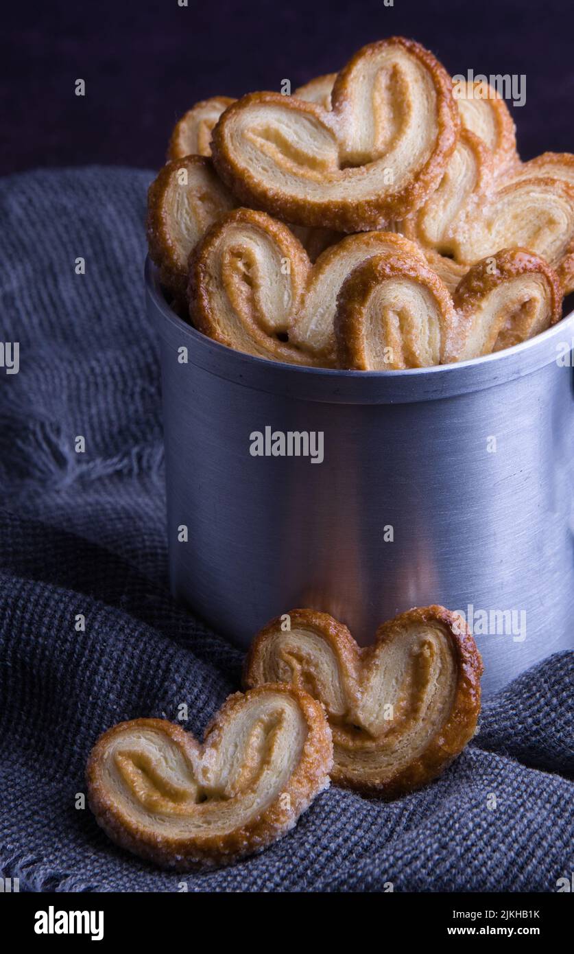Homemade sugar buns also called palmiers, elephant ear or puff pastry ...