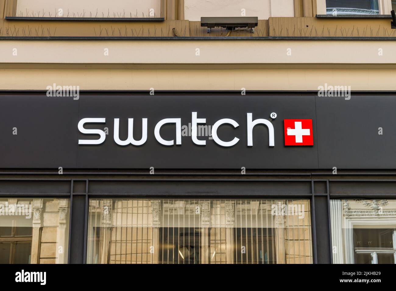 The sign above the entrance of the Swatch retail store. Krakow, Poland ...