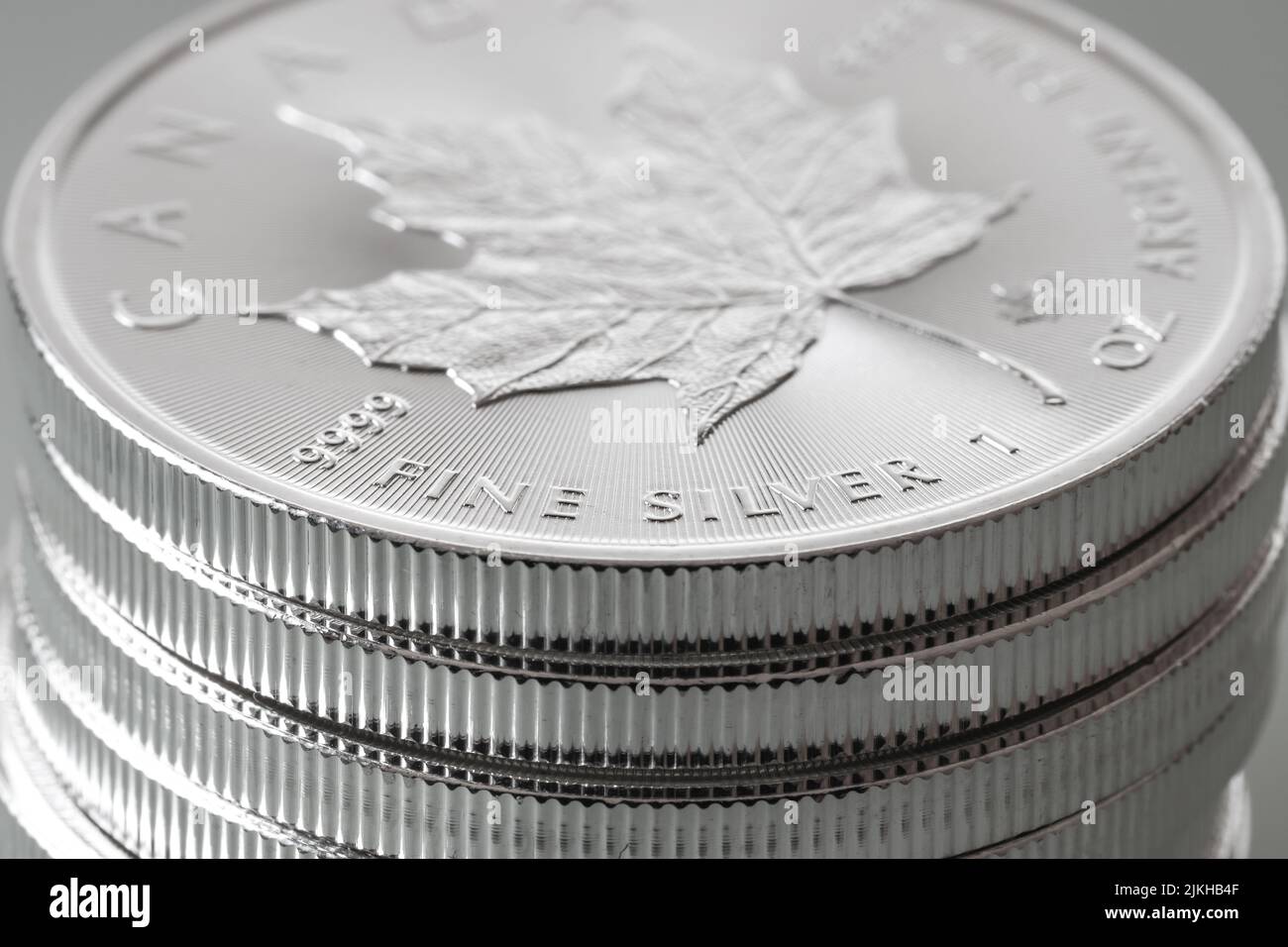 A pile of fine silver Canadian coins Stock Photo - Alamy