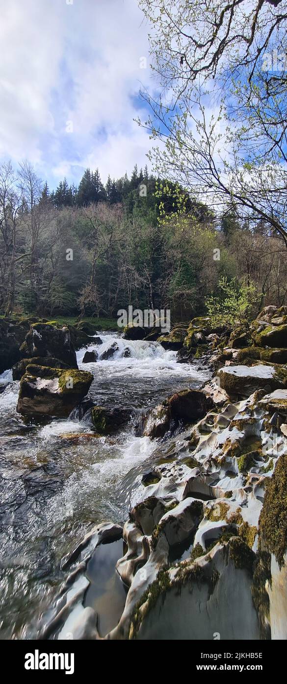 A river on Glyder Fach mountain in Snowdonia, north-west Wales, the UK ...