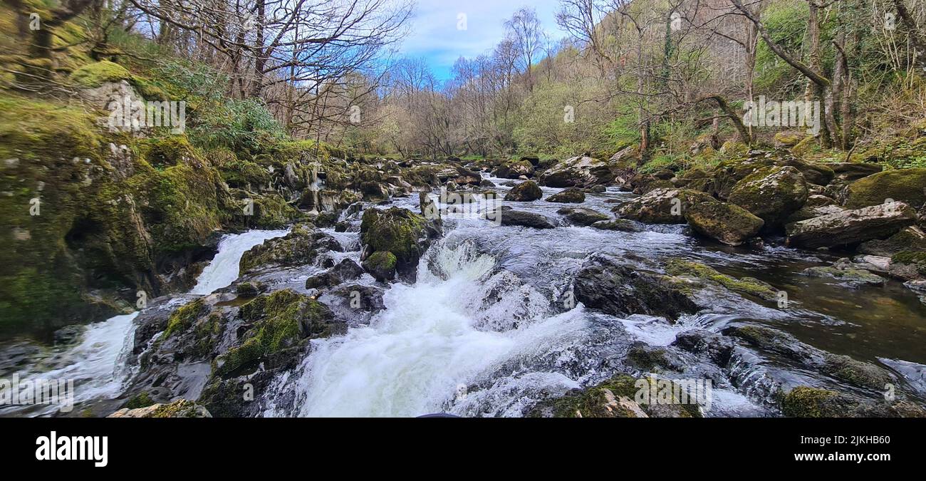 A river on Glyder Fach mountain in Snowdonia, north-west Wales, the UK ...