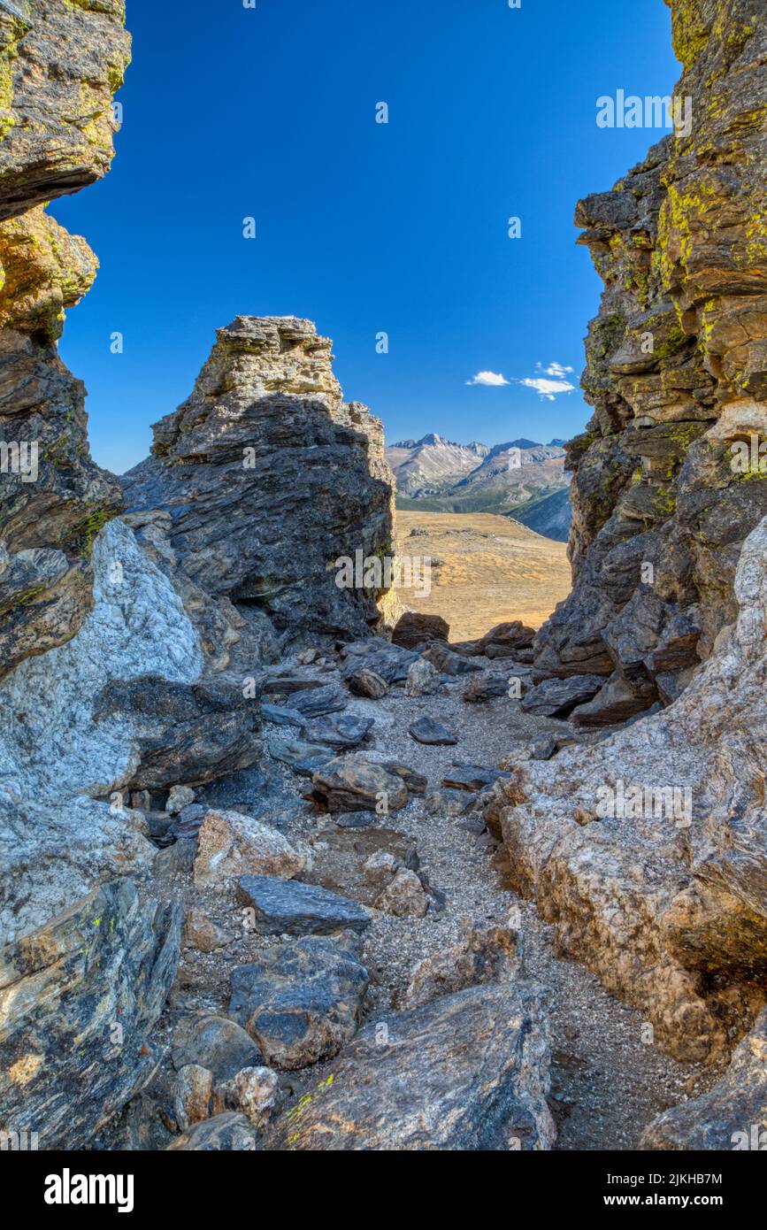 A vertical shot of two rocks formations in the Alpine Tundra at Rocky ...