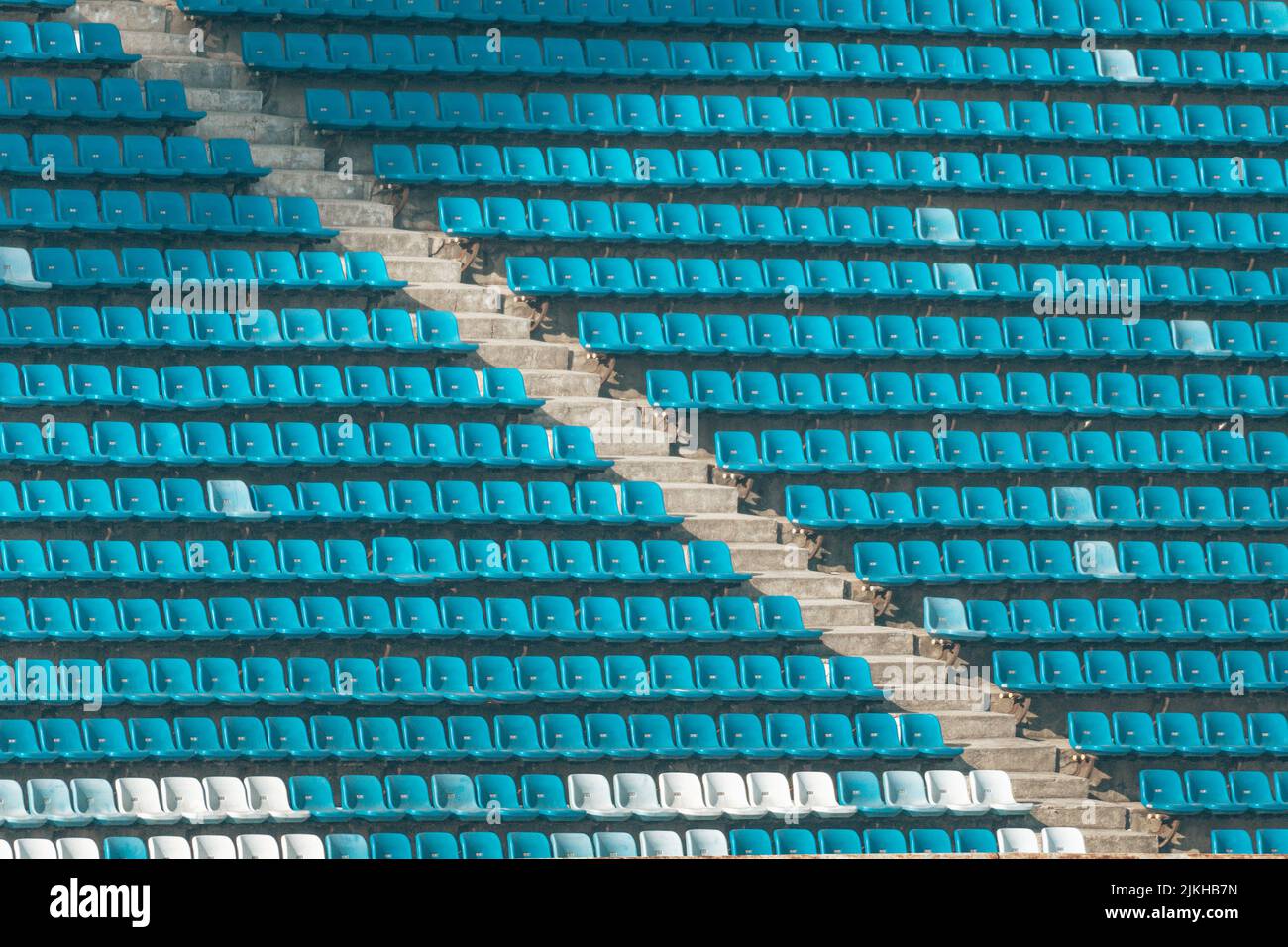 Many large Aligned blue lines of empty theater seats Stock Photo - Alamy