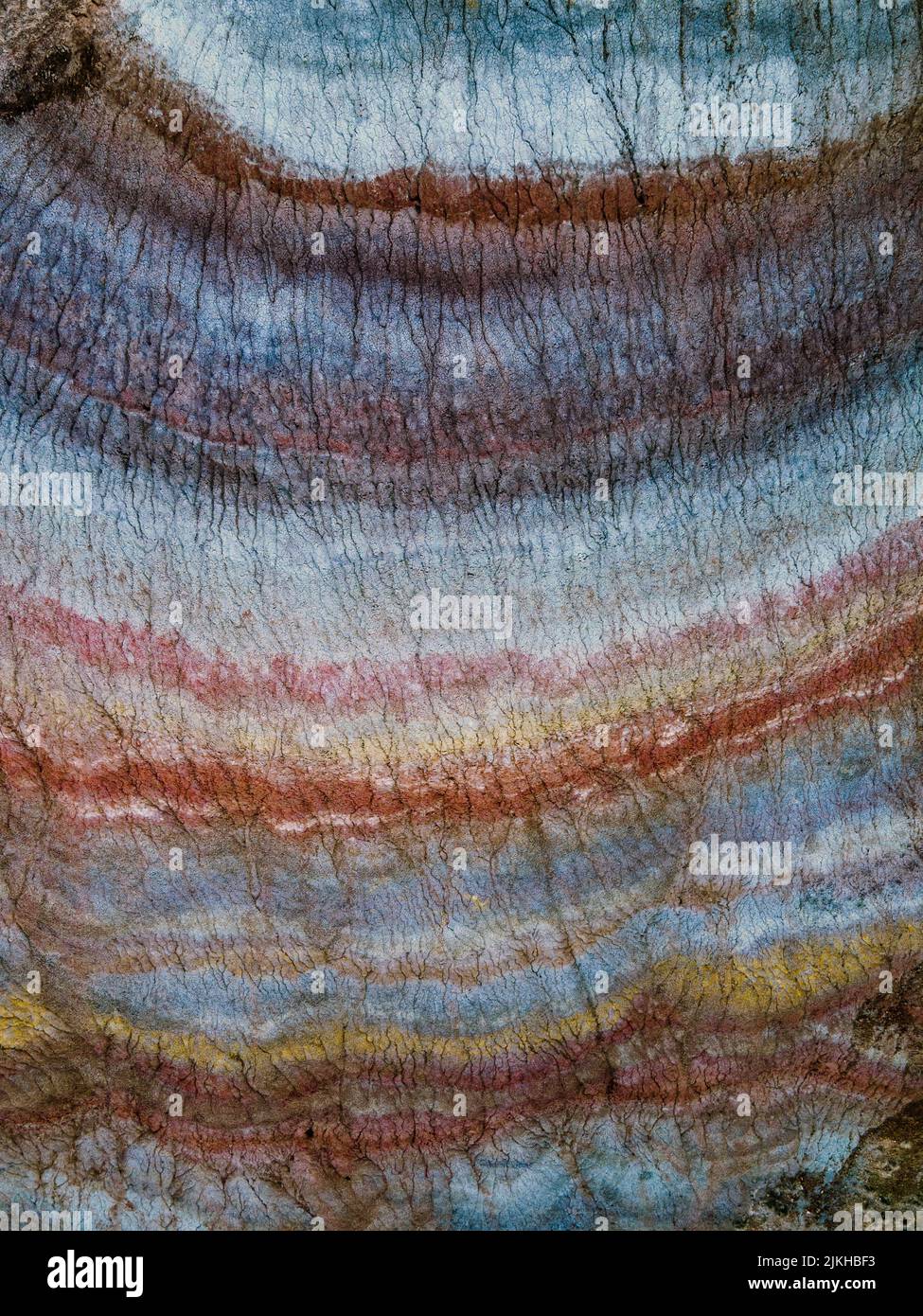 A vertical shot of the beautiful natural sandstone with unique patterns ...