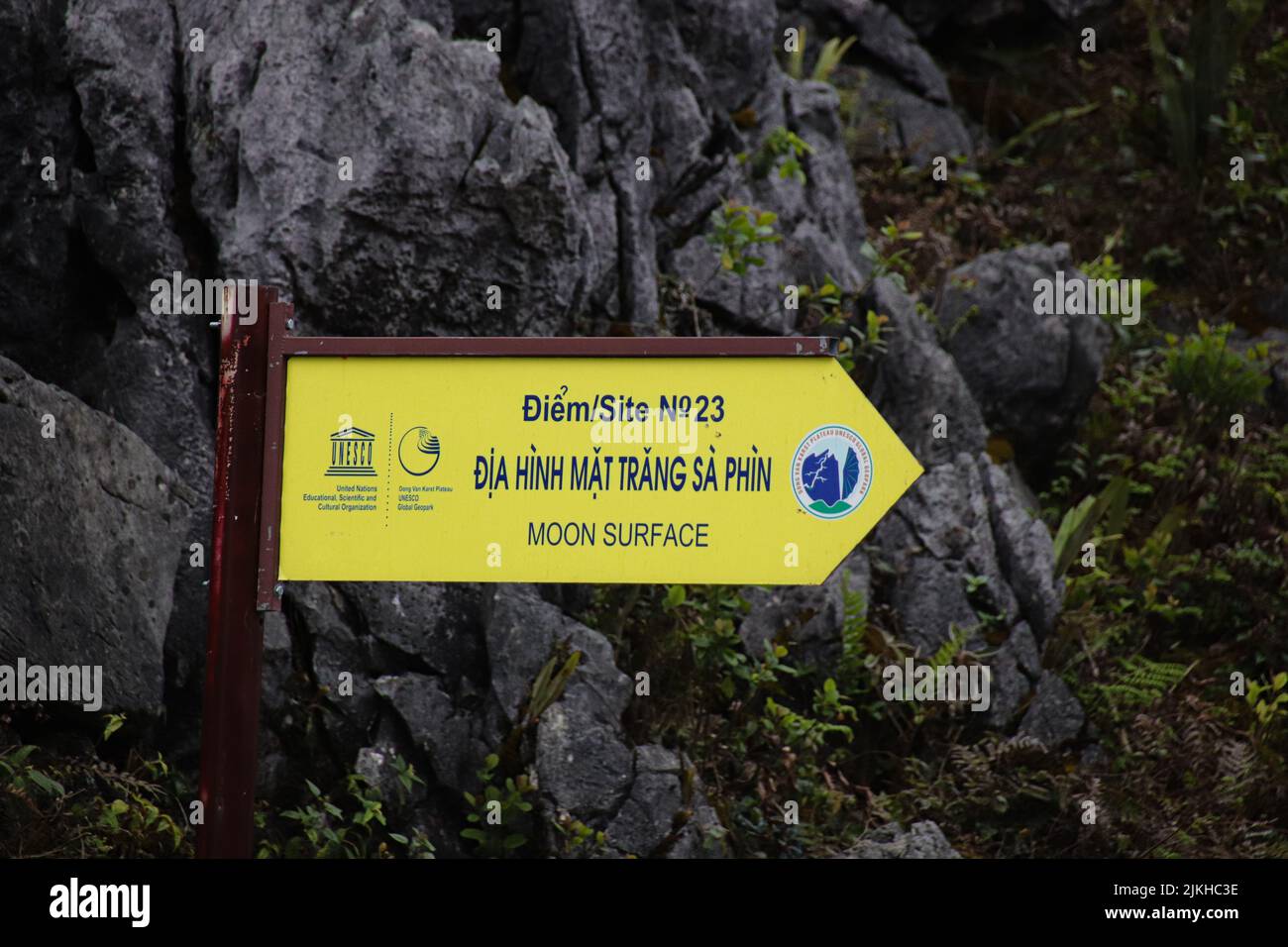 Sign written in Vietnamese with english translation leading to the moon ...