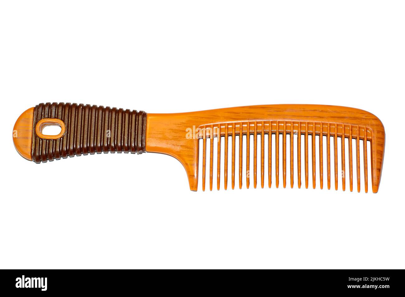 The brown hair comb on white background Stock Photo - Alamy