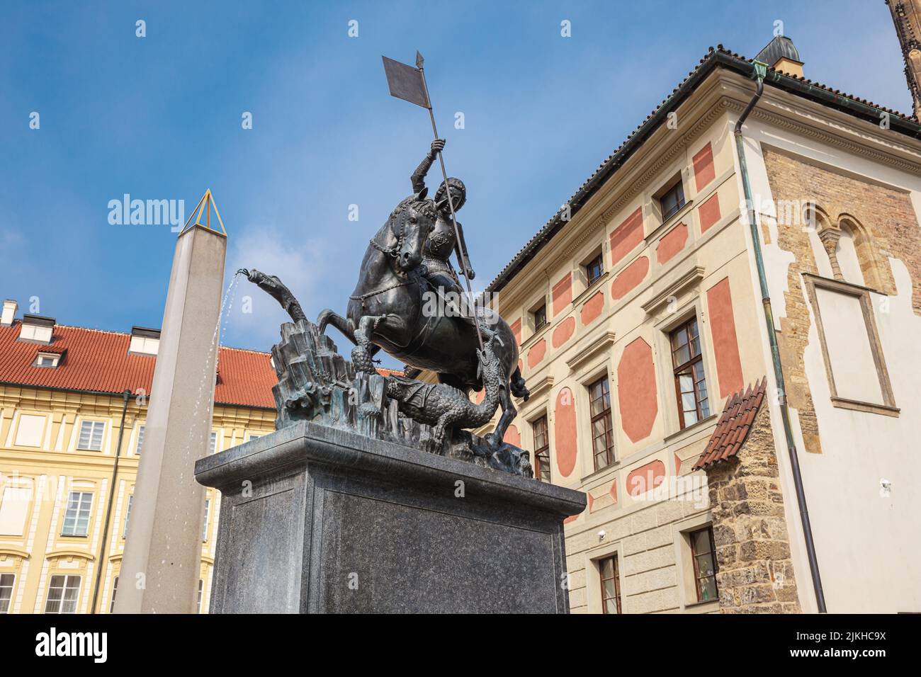 A low angle shot of the statue of Saint George slaying the dragon in ...