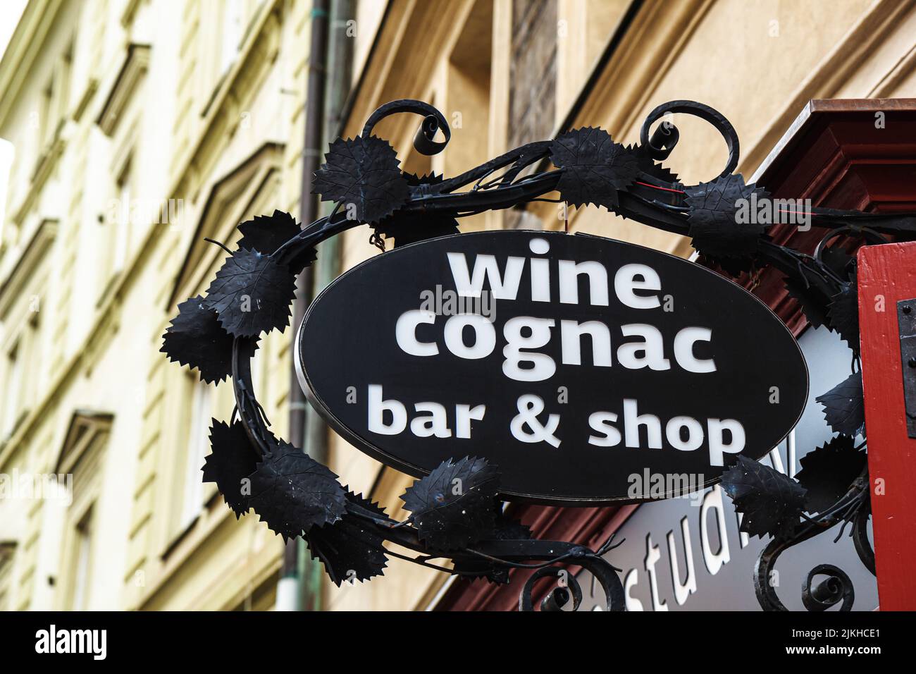 A closeup of the Wine cognac bar and shop signboard on the background ...