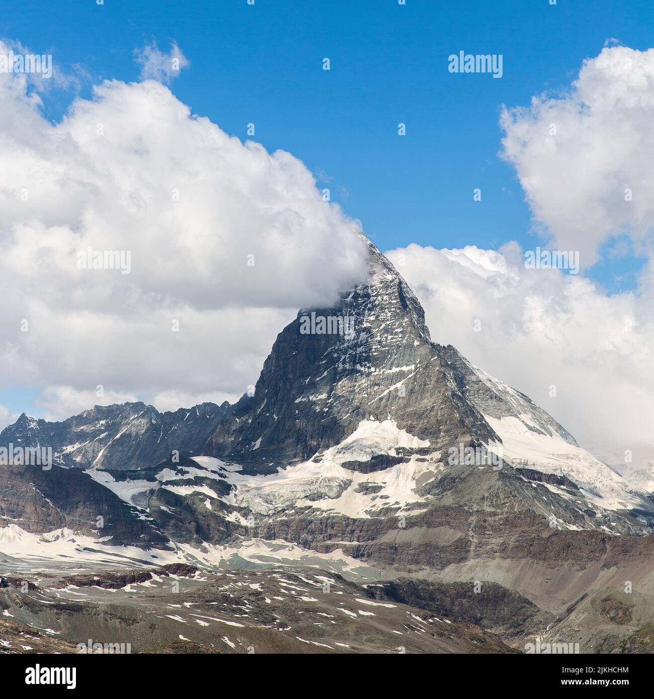 Tetrahedral pyramidal mountain Matterhorn in the Swiss Alps Stock Photo ...