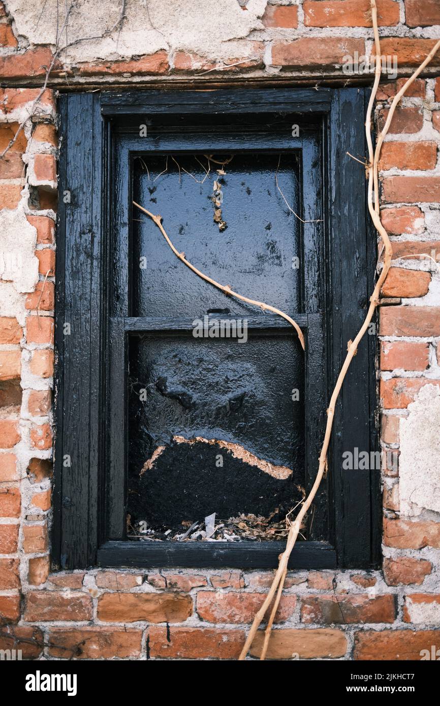 An old black window in the building Stock Photo - Alamy