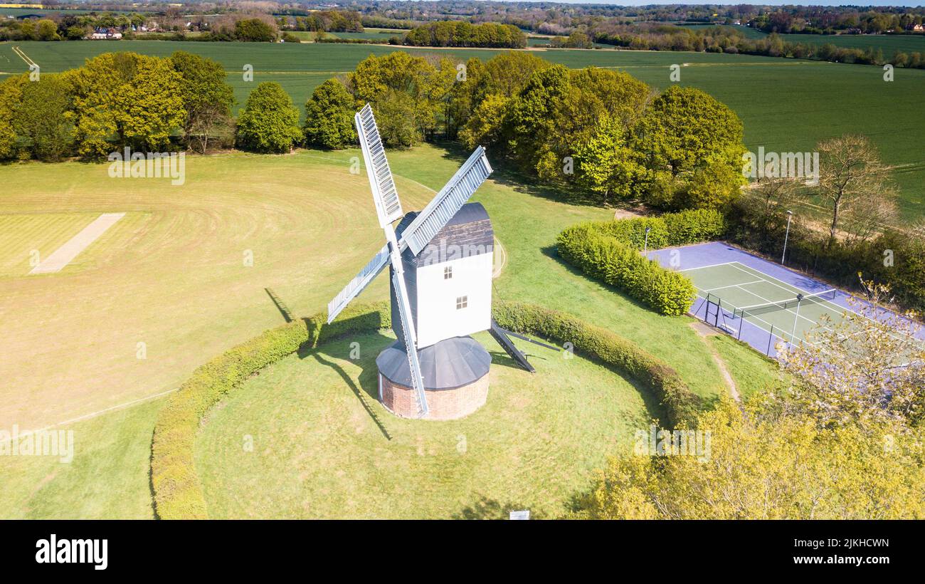 An aerial drone shot of the Mountnessing Windmill in Essex, England ...