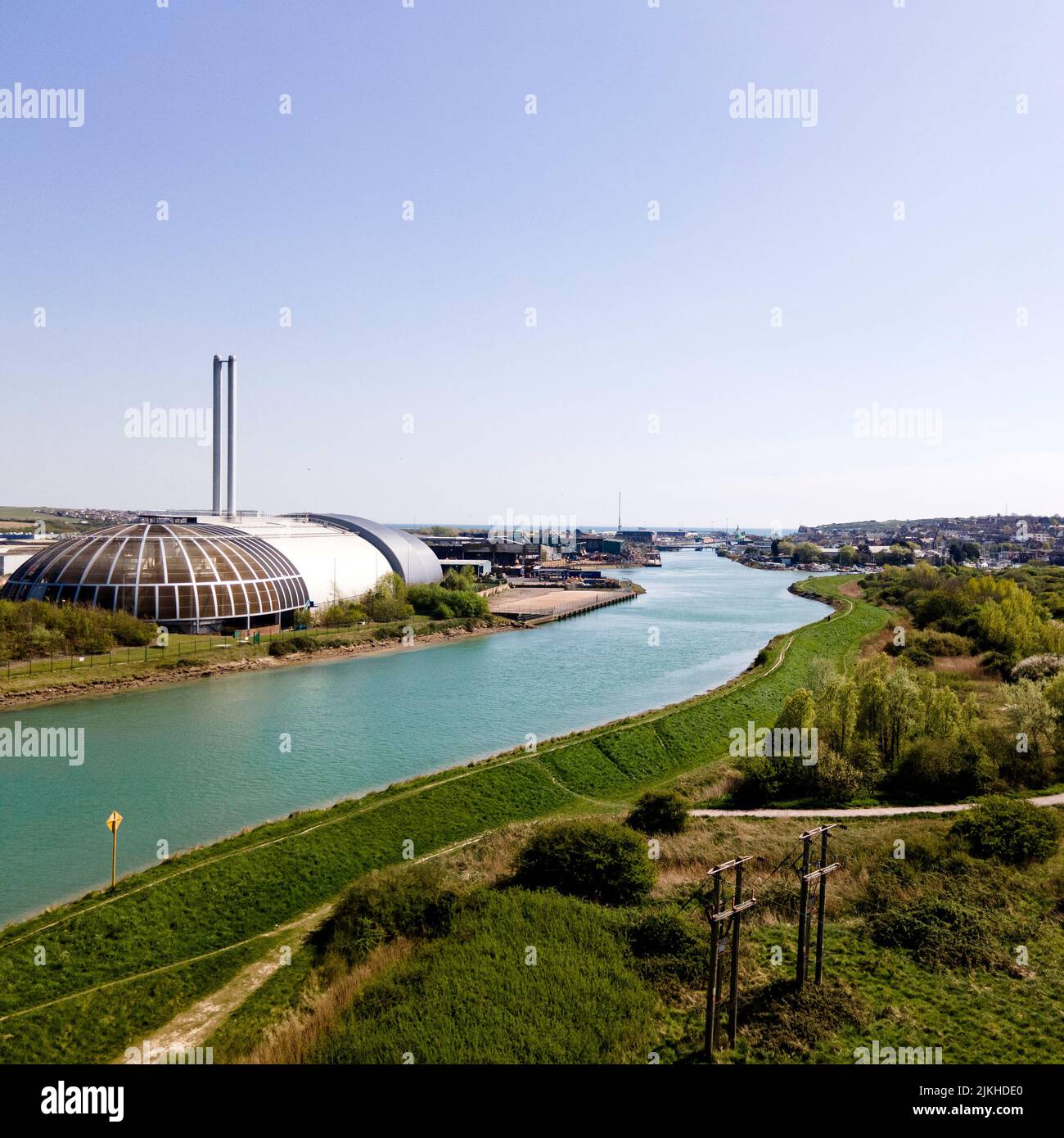 An aerial shot of the beautiful Ouse river in the middle of green parks ...