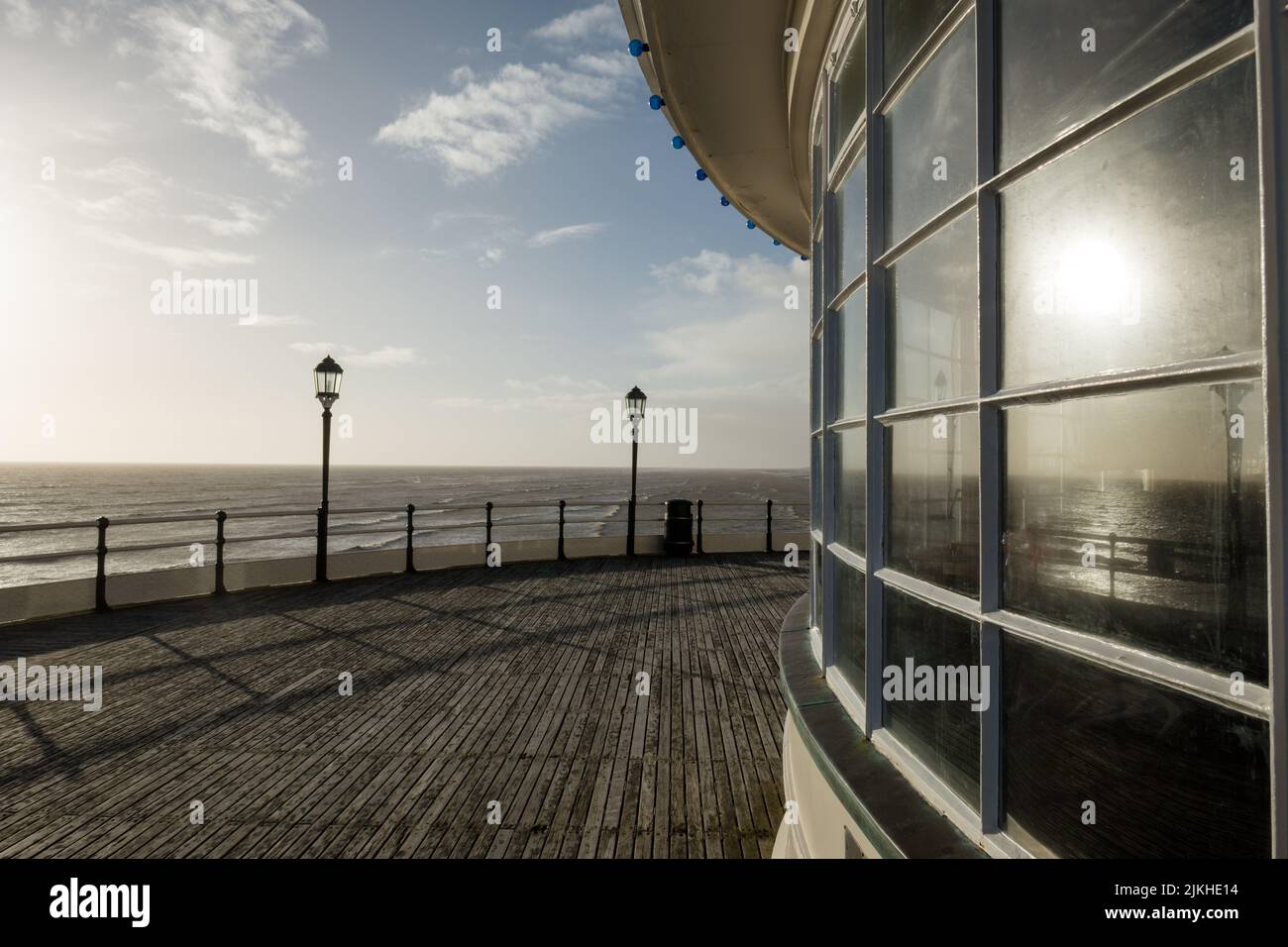 The lobby of Worthing Pier with light reflection on window glass in ...
