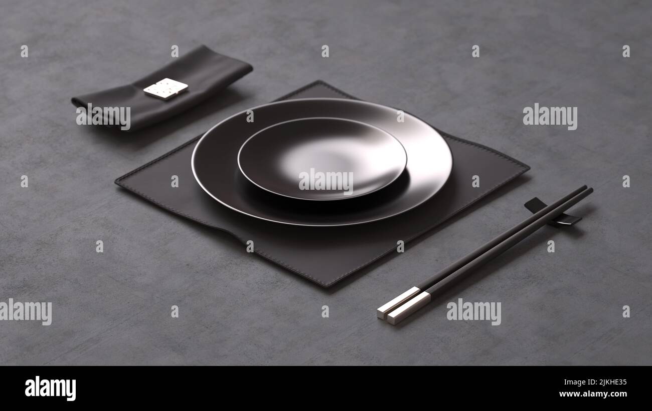 A closeup of black Asian tableware on a gray table Stock Photo - Alamy