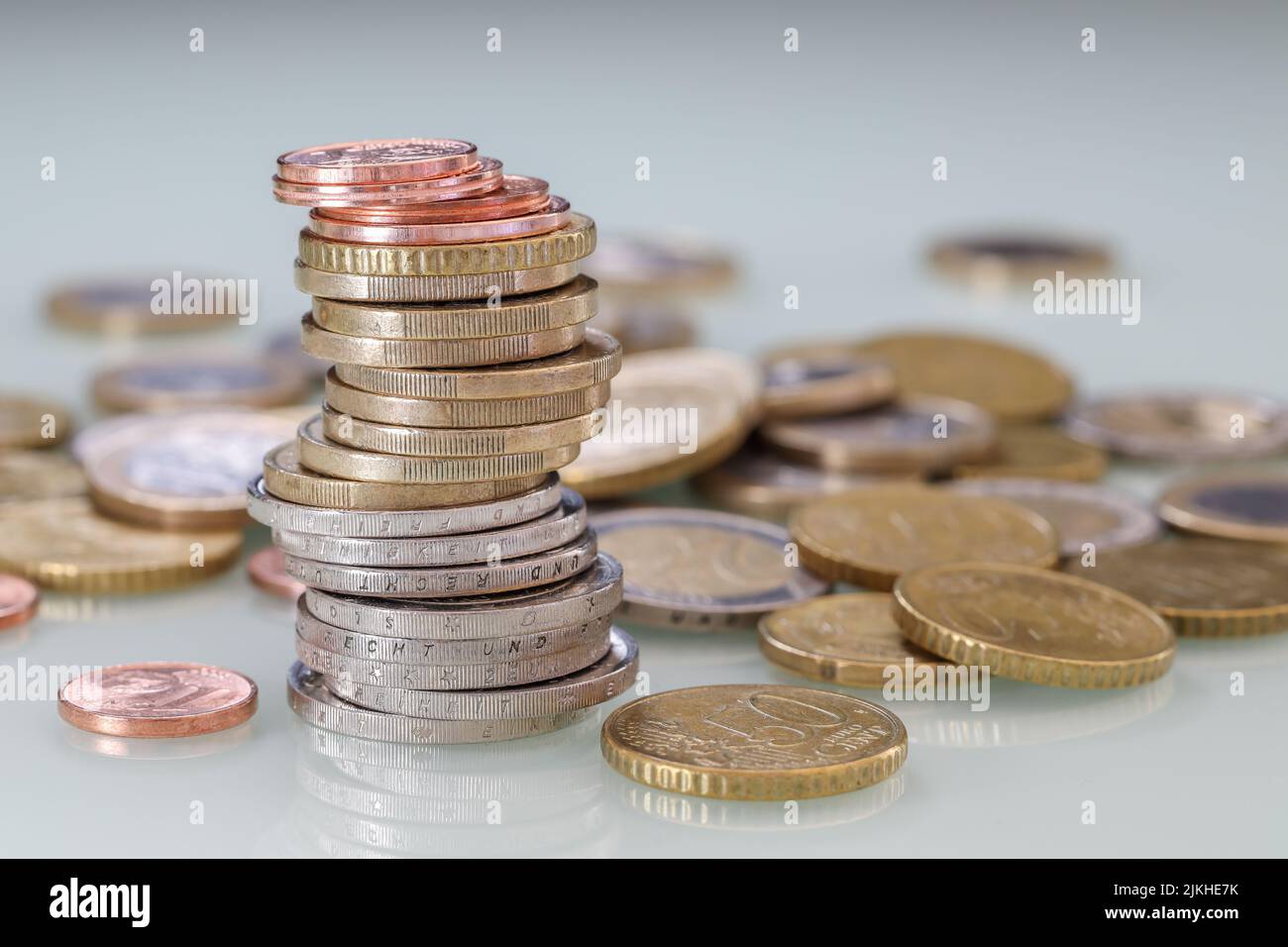 A closeup shot of pile of Euro coins and stack Stock Photo - Alamy