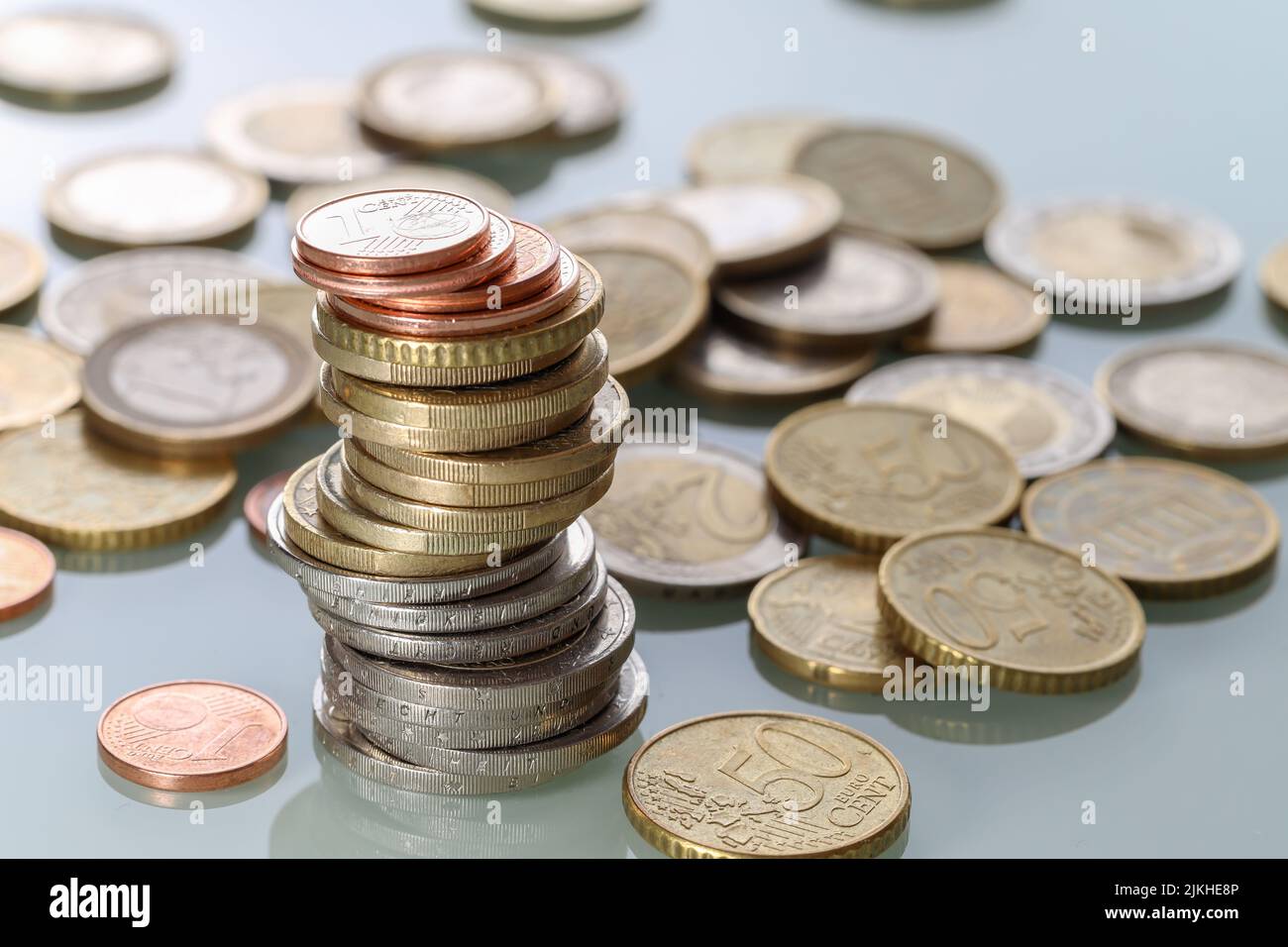 A pile of Euro coins and stack Stock Photo - Alamy