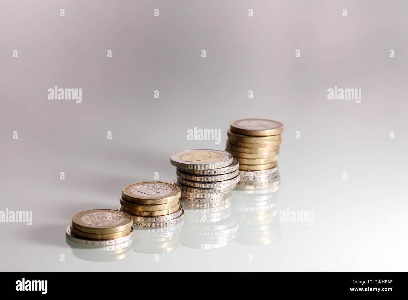 A pile of stacks Euro coins Stock Photo - Alamy