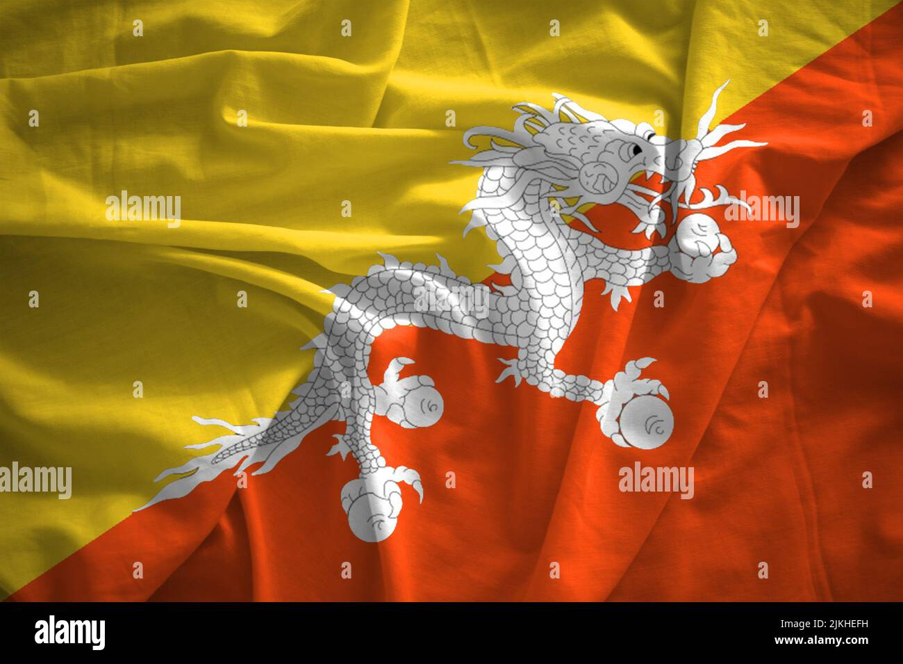 Bhutan flag with 3d effect Stock Photo - Alamy