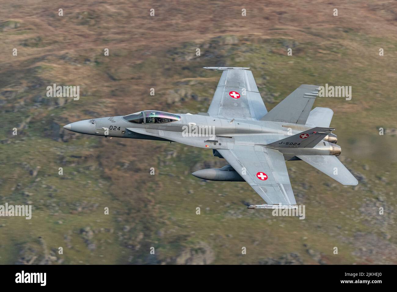A Swiss Air Force F18 Hornet low-level training over the Thirlmere Lake ...