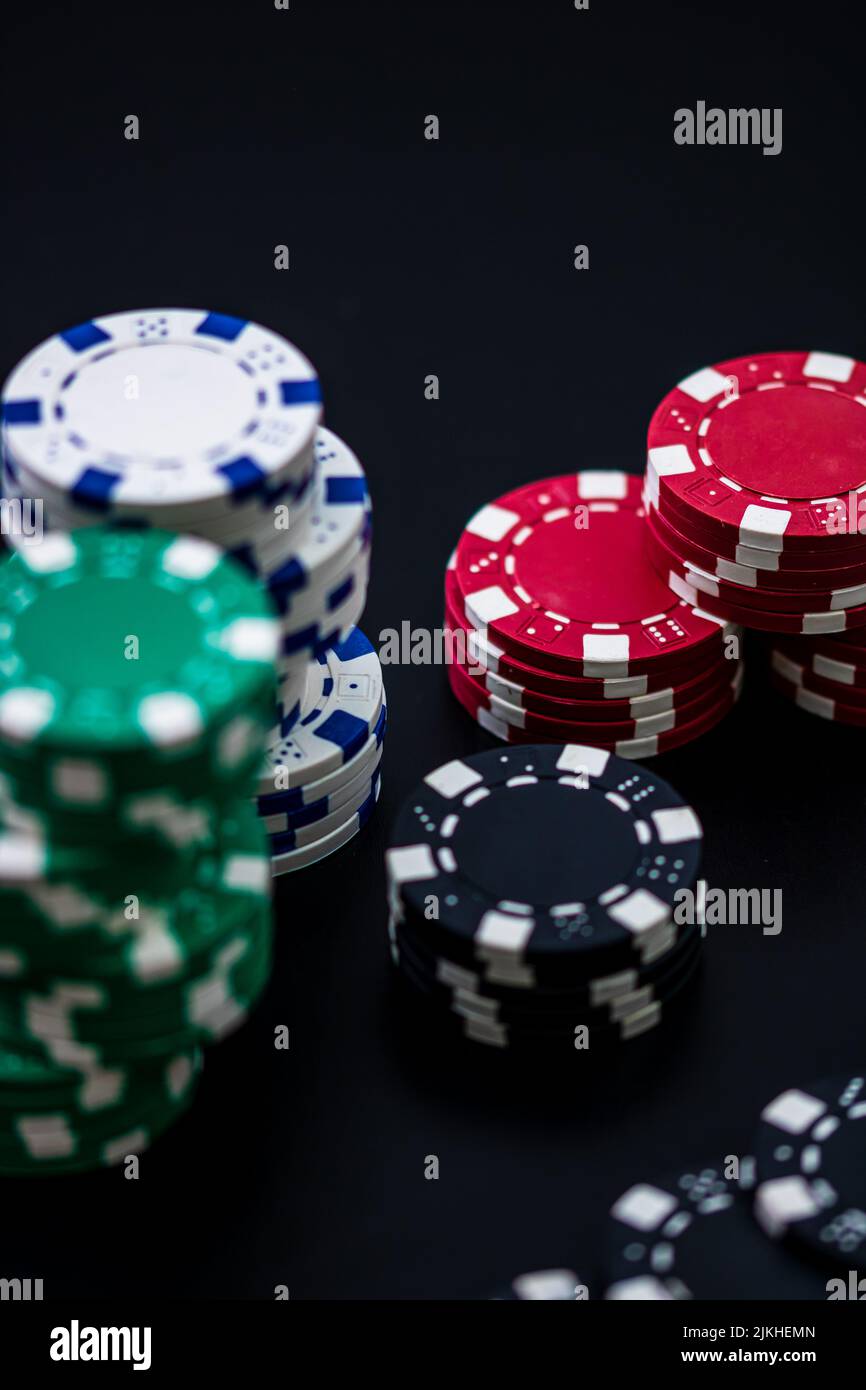 Stacks of poker chips detail with cards Stock Photo - Alamy