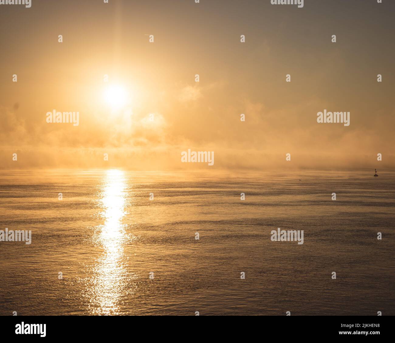 A mesmerizing view of a beautiful seascape at scenic sunset Stock Photo ...