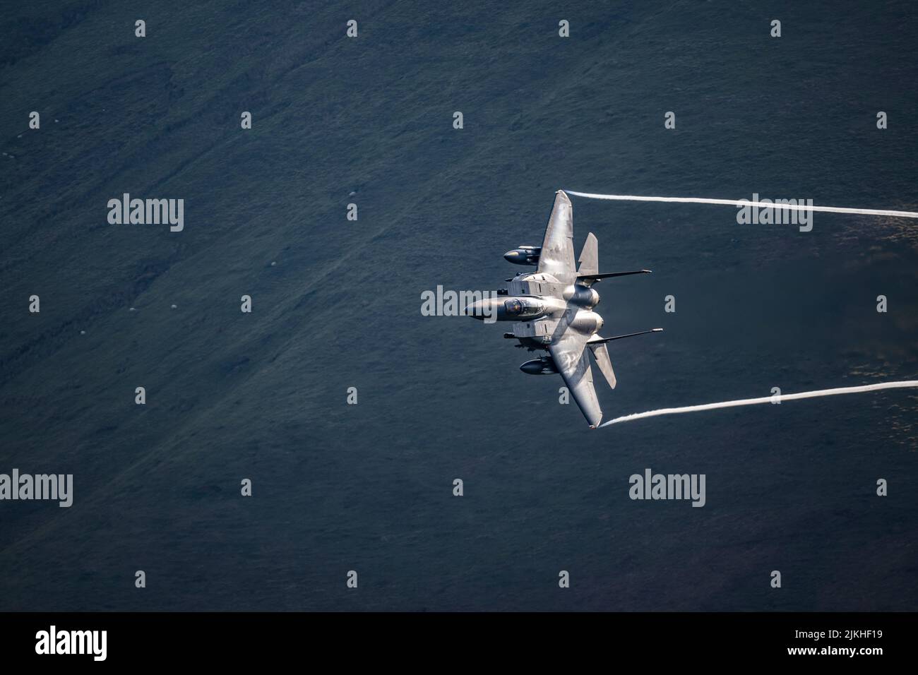 A low flying USAF F15E Lakenheath Jet training in Mach Loop, North ...