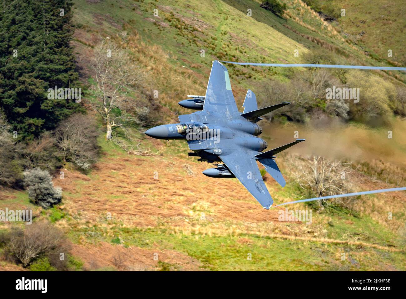 An aerial shot of a USAF F15E jet training in the Mach Loop, North ...