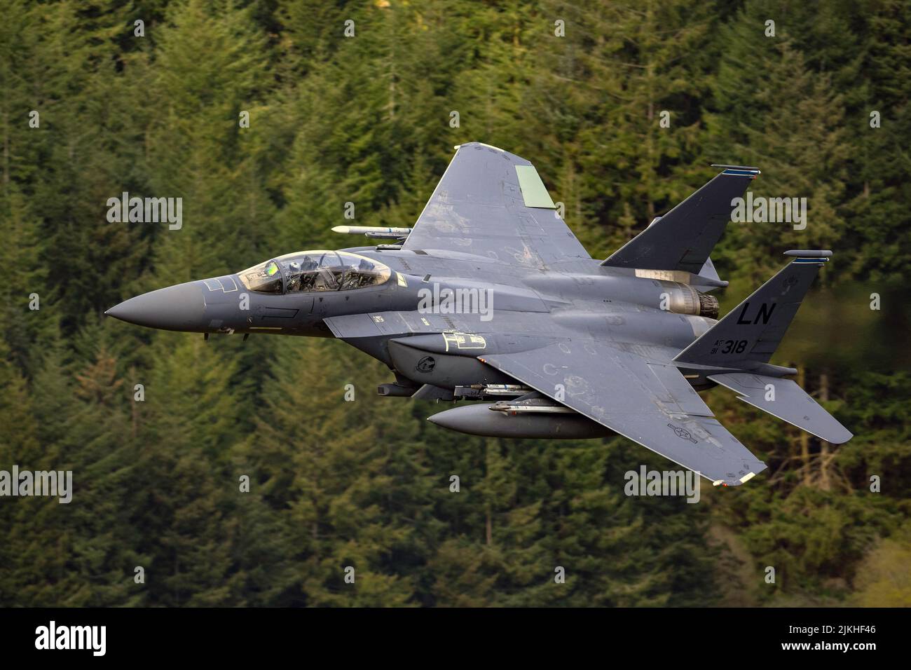An aerial shot of a USAF F15E training in the Mach Loop, North Wales ...