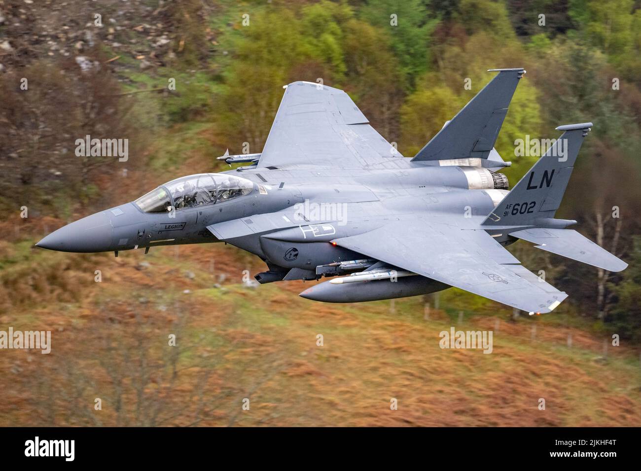 An aerial shot of a USAF F15E jet training in the Mach Loop, North Wales Stock Photo - Alamy