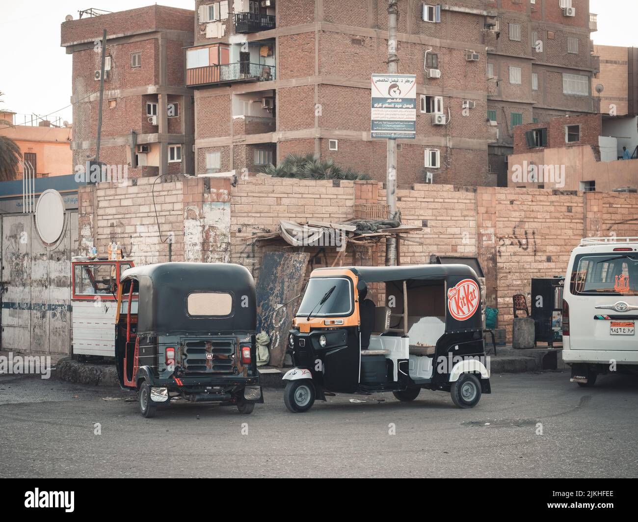 A view of parked auto rickshaws on a street in Egypt, Aswan Stock Photo ...