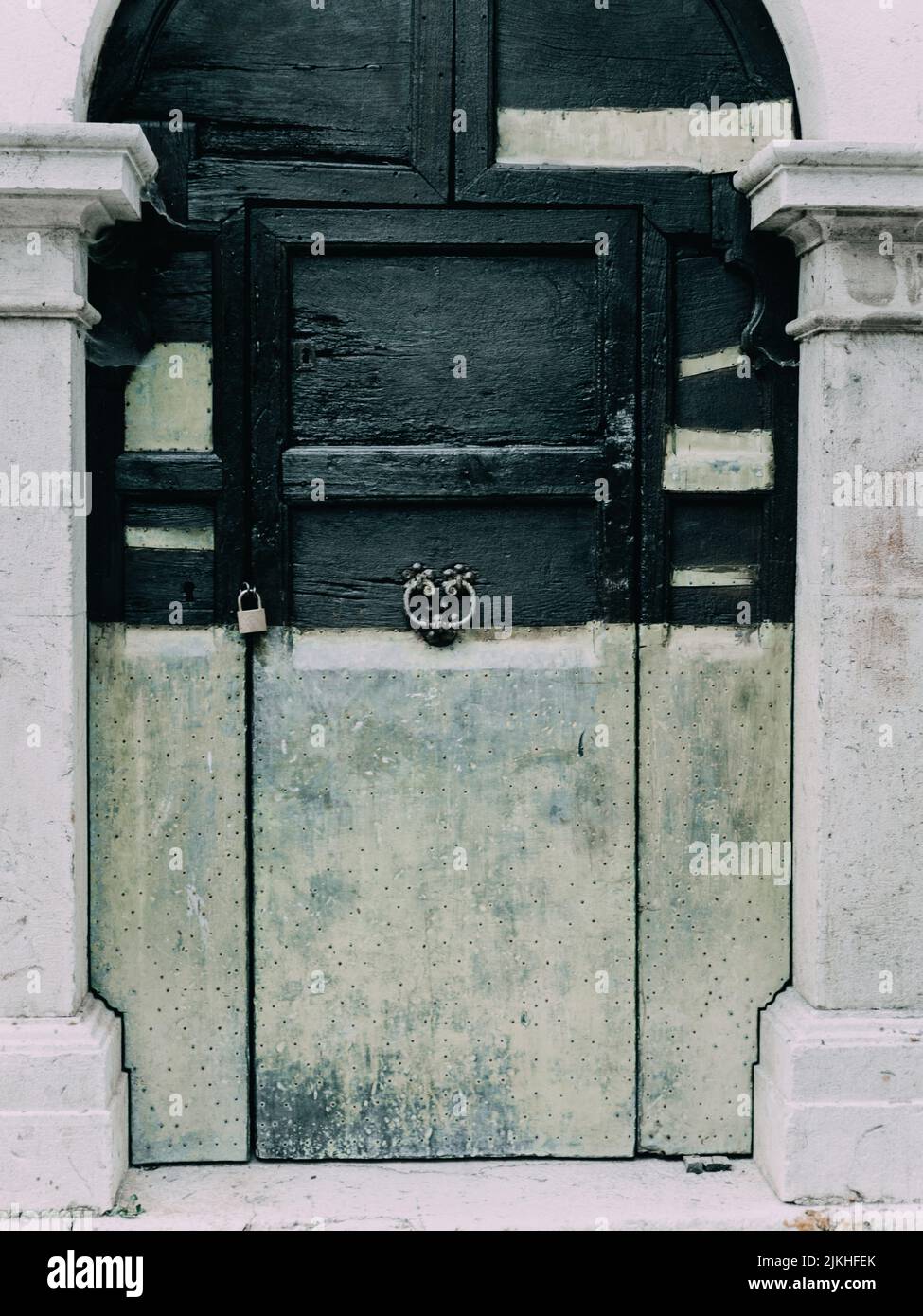 Front of abandoned house with blue door Stock Photo - Alamy