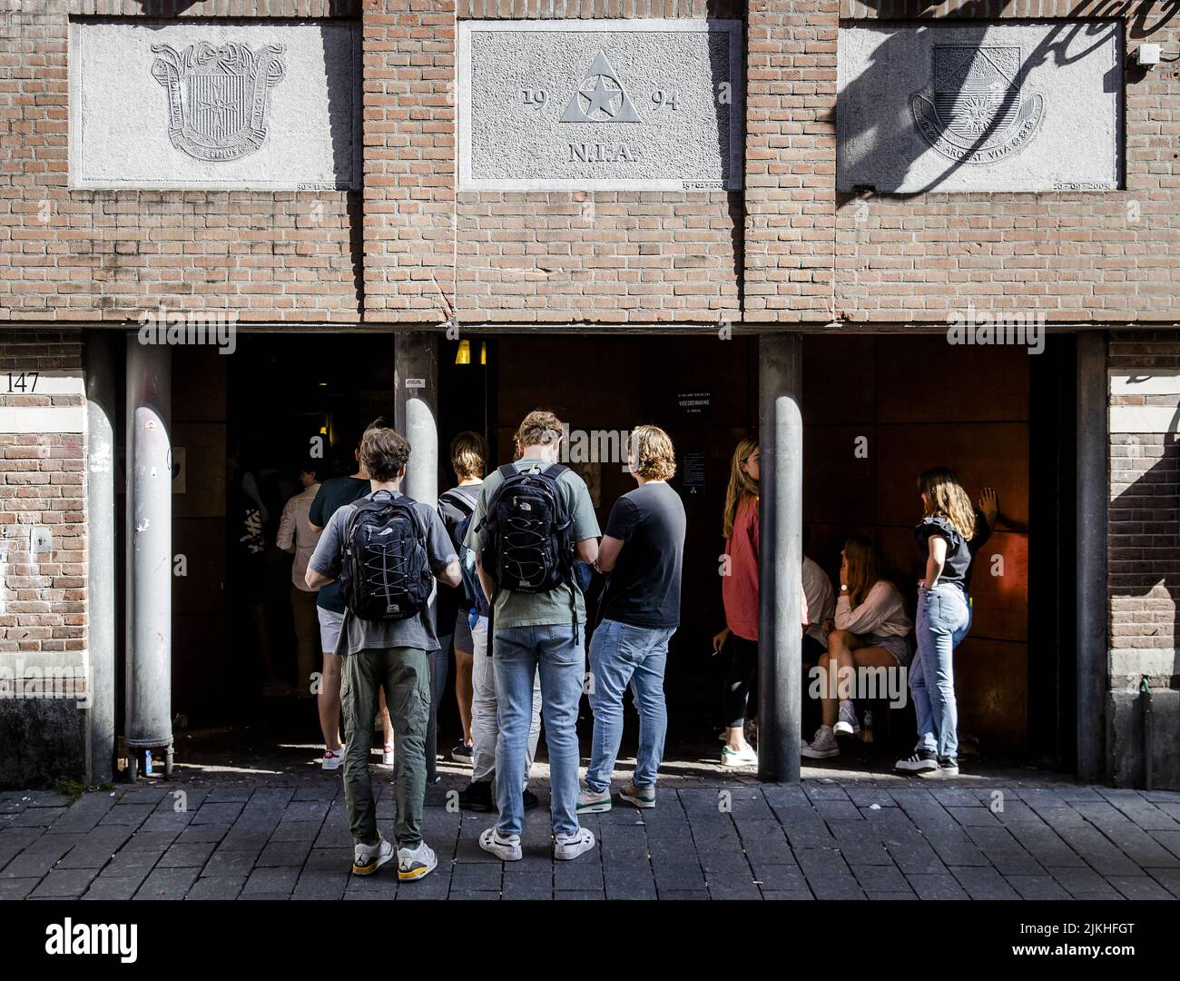 2022-08-02 17:09:04 AMSTERDAM - People waiting at the building of the ...