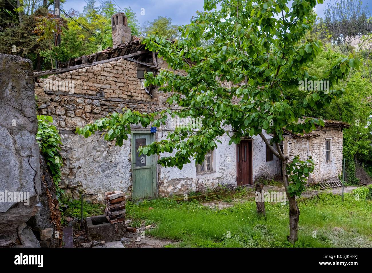 An old rustic house surrounded by trees in Ohrid, North Macedonia Stock ...