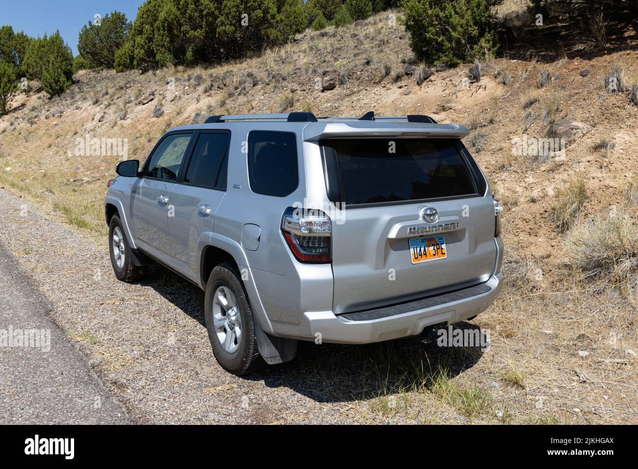 A gray Toyota 4 runner SUV on a mountain drive Stock Photo - Alamy