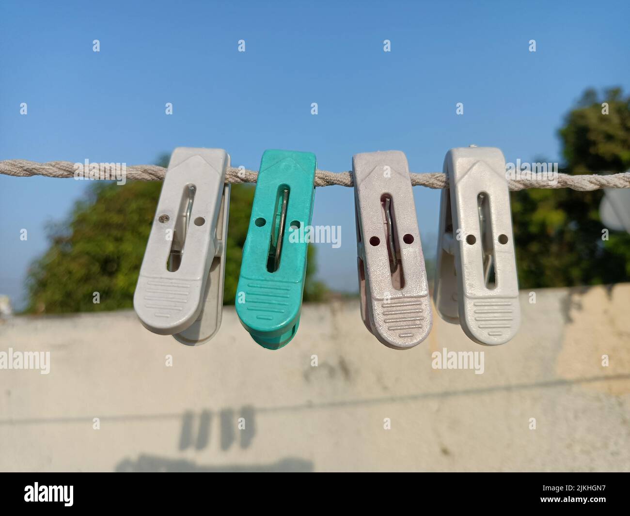 Blue laundry clips hi-res stock photography and images - Alamy