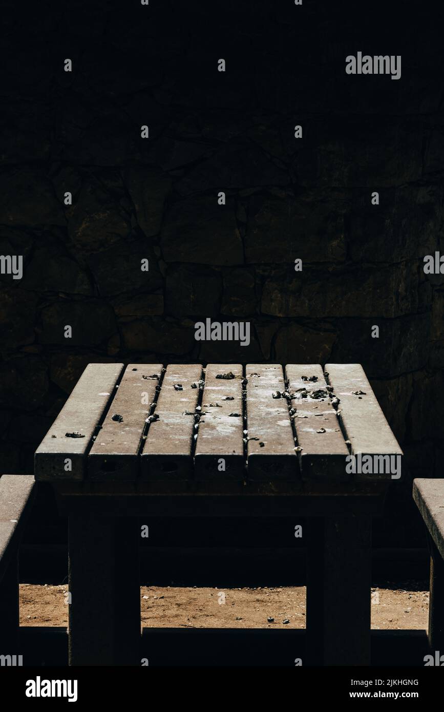 Bird poop on picnic table with copy space Stock Photo - Alamy
