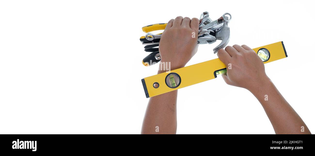 The hands holding tools on isolated white background with copy space ...