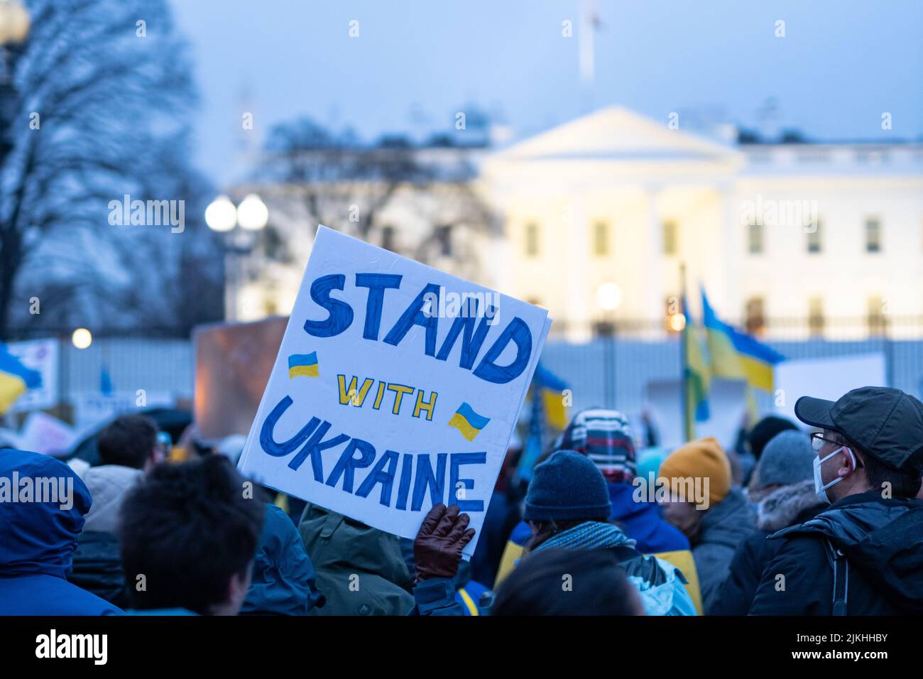 Anti-war Protesters holding pro-Ukraine signs outside the White House ...