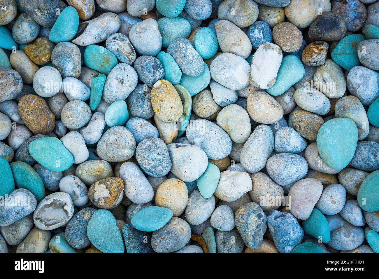 A top view of colorful pebbles texture background Stock Photo - Alamy