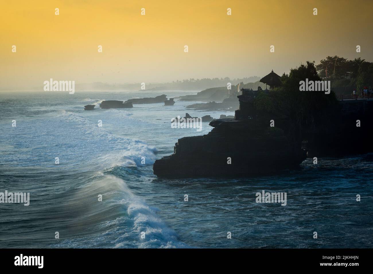 A mesmerizing sunset view over the sea on a windy evening in summer in ...