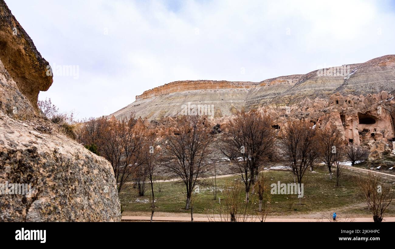 Geological formations in Cappadocia under a cloudy sky, Turkey Stock ...