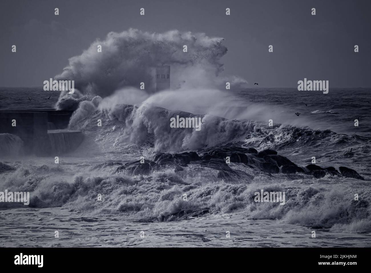 Stormy sea wave splash. Used infrared filter. Douro river mouth, Porto ...