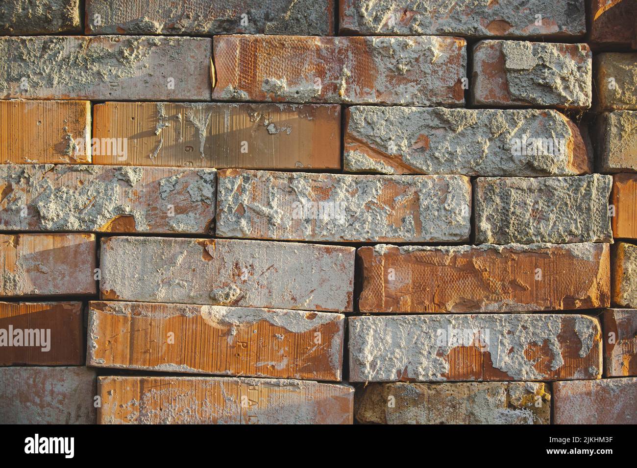 brick pile with cement on it Stock Photo - Alamy