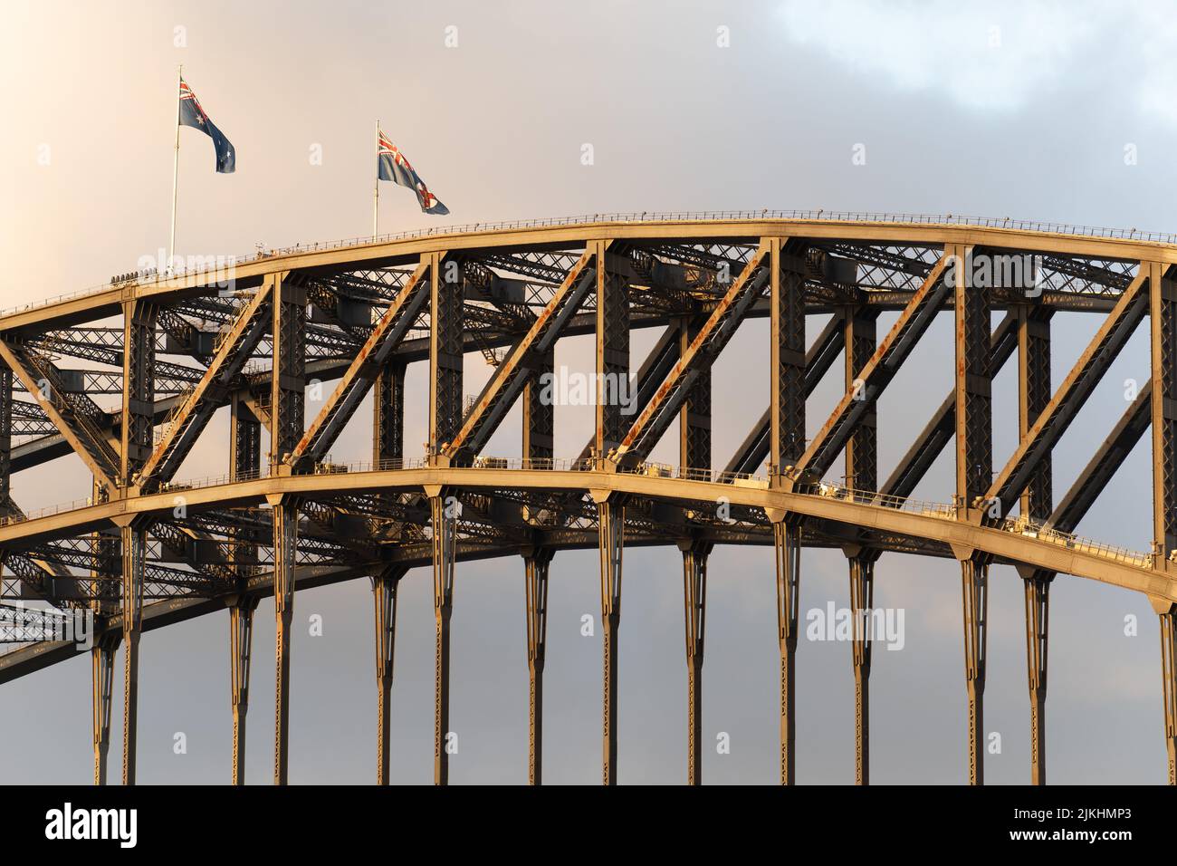 The Australian flags flying on the top of the Sydney Harbour Bridge ...