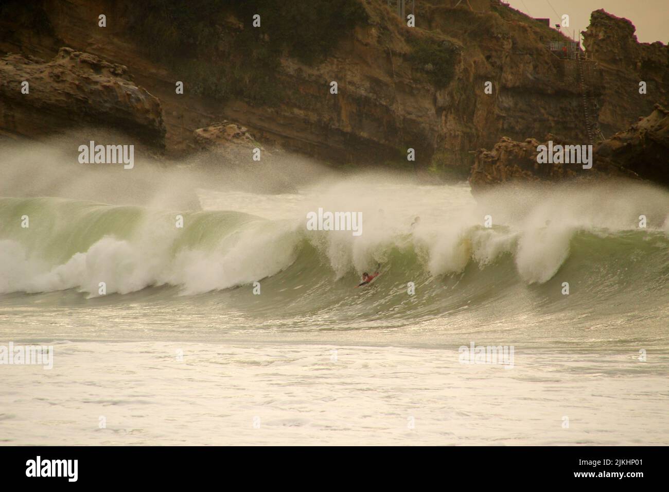 Caught by wave beach hi-res stock photography and images - Alamy