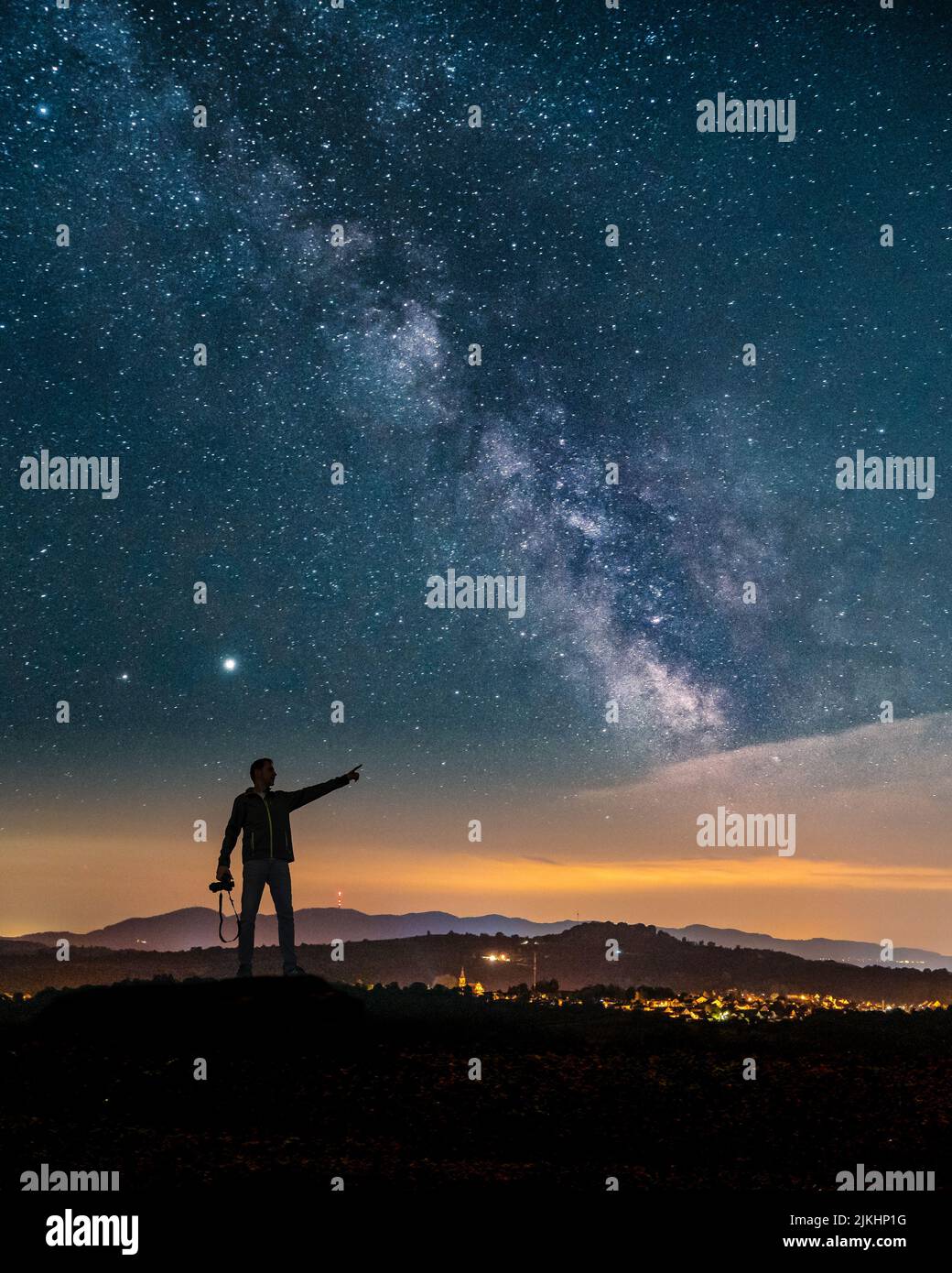 Hand pointing star in hi-res stock photography and images - Alamy