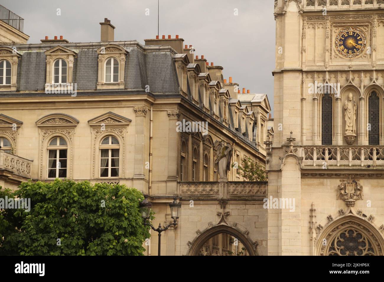 A closeup shot of the French style building facade with balconies in ...
