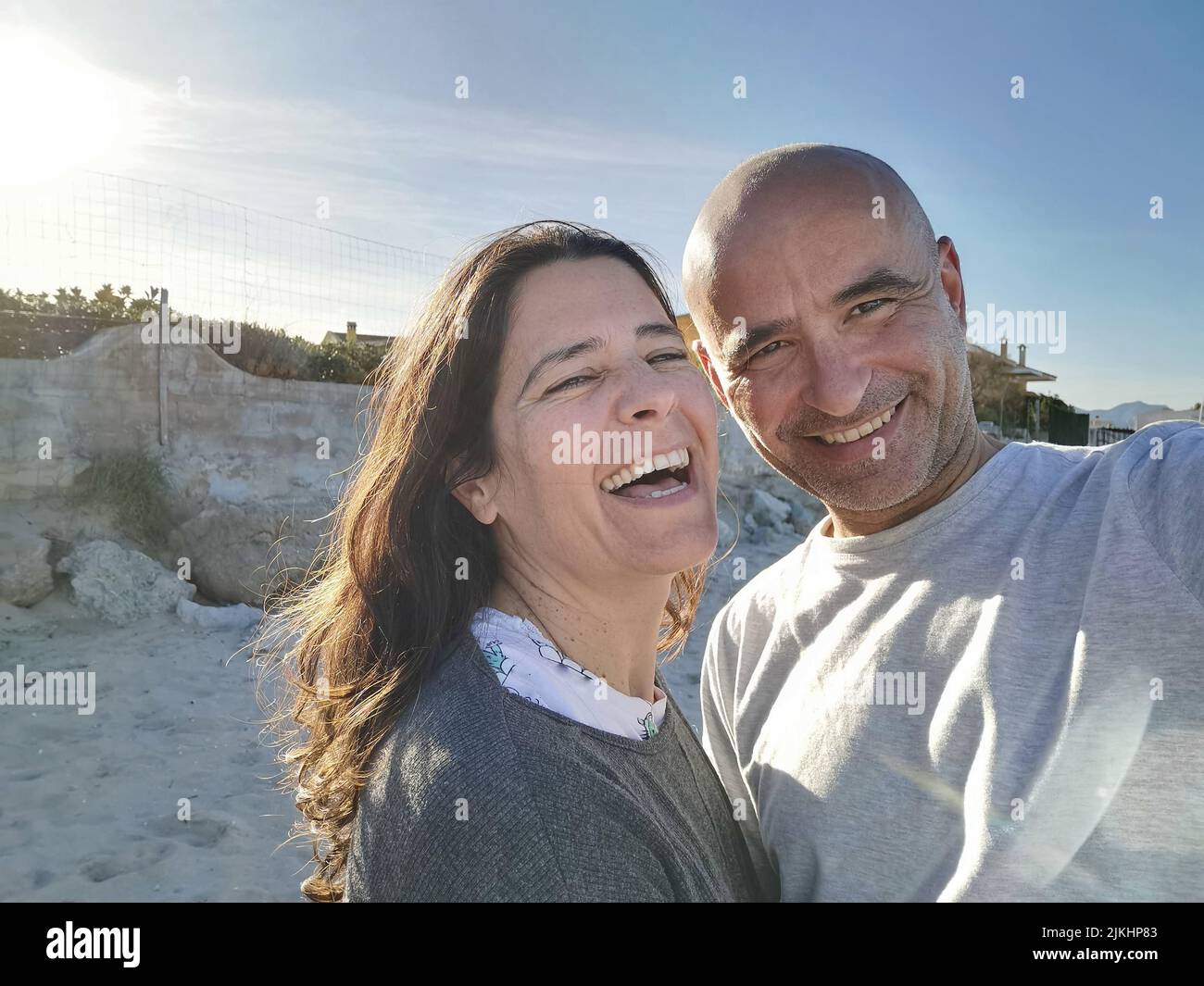 A close-up shot of a middle-aged Spanish couple enjoying themselves ...